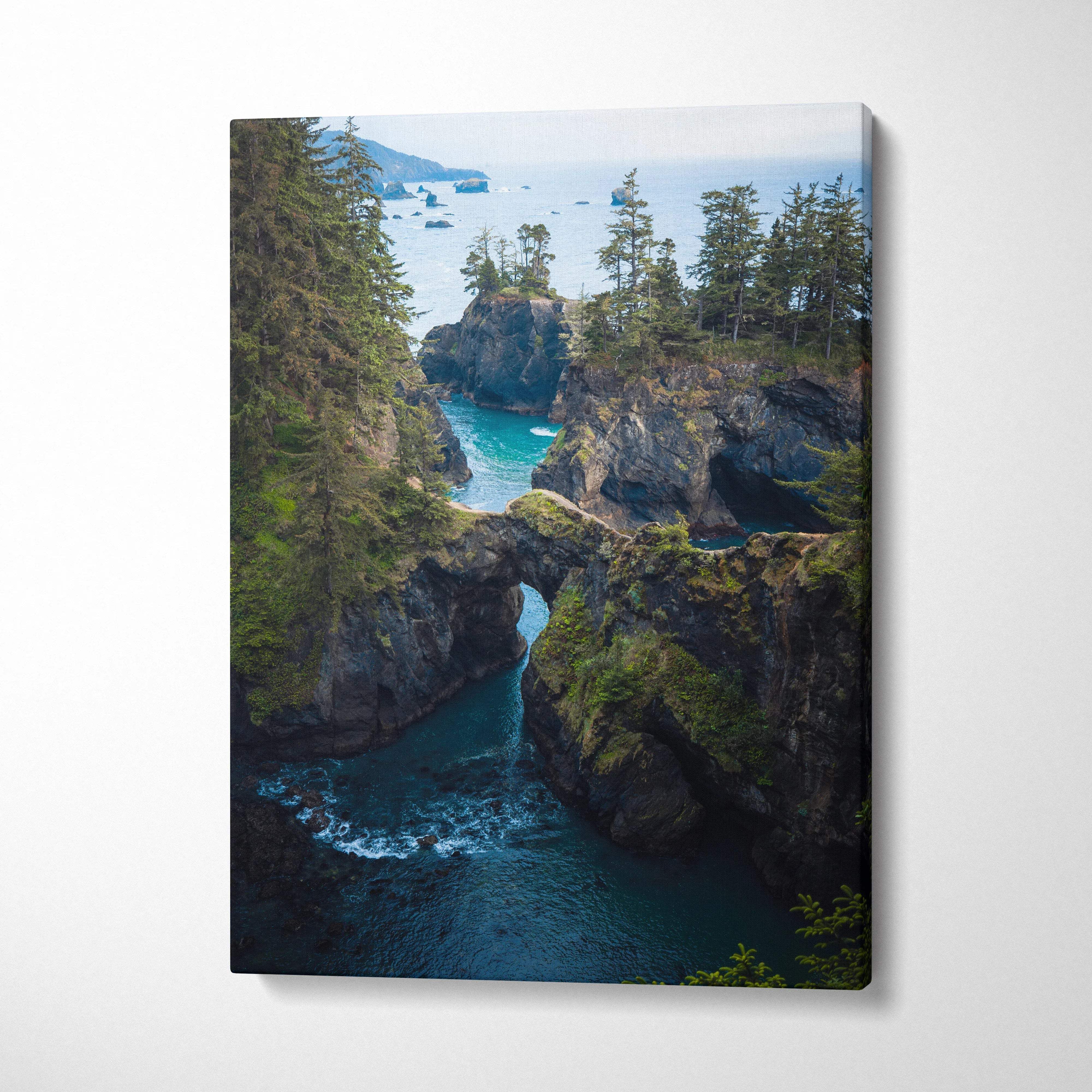 Rugged Coastal Cliffs With Natural Rock Arch Over Emerald Water And Ev ...